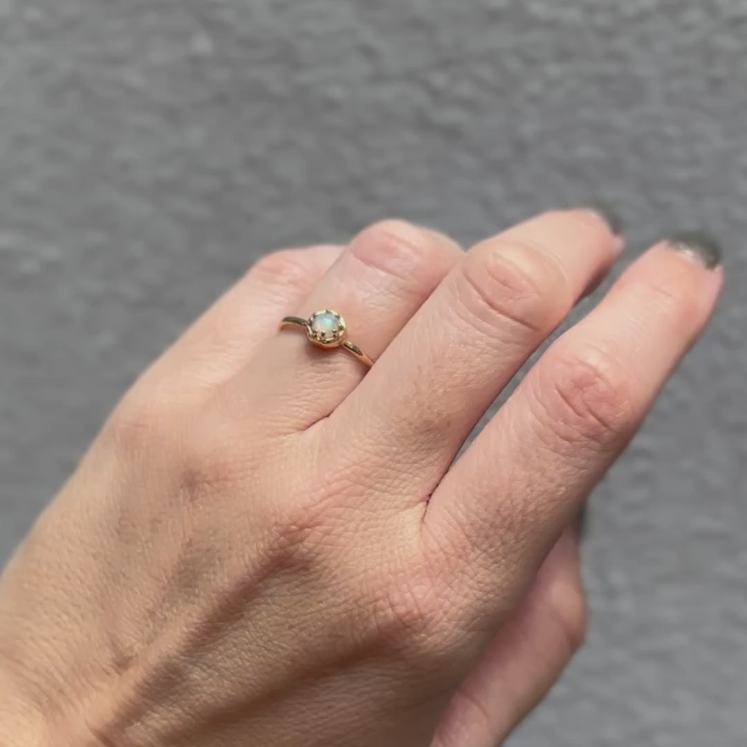 Tiny Opal Ring opens full screen video in same window.