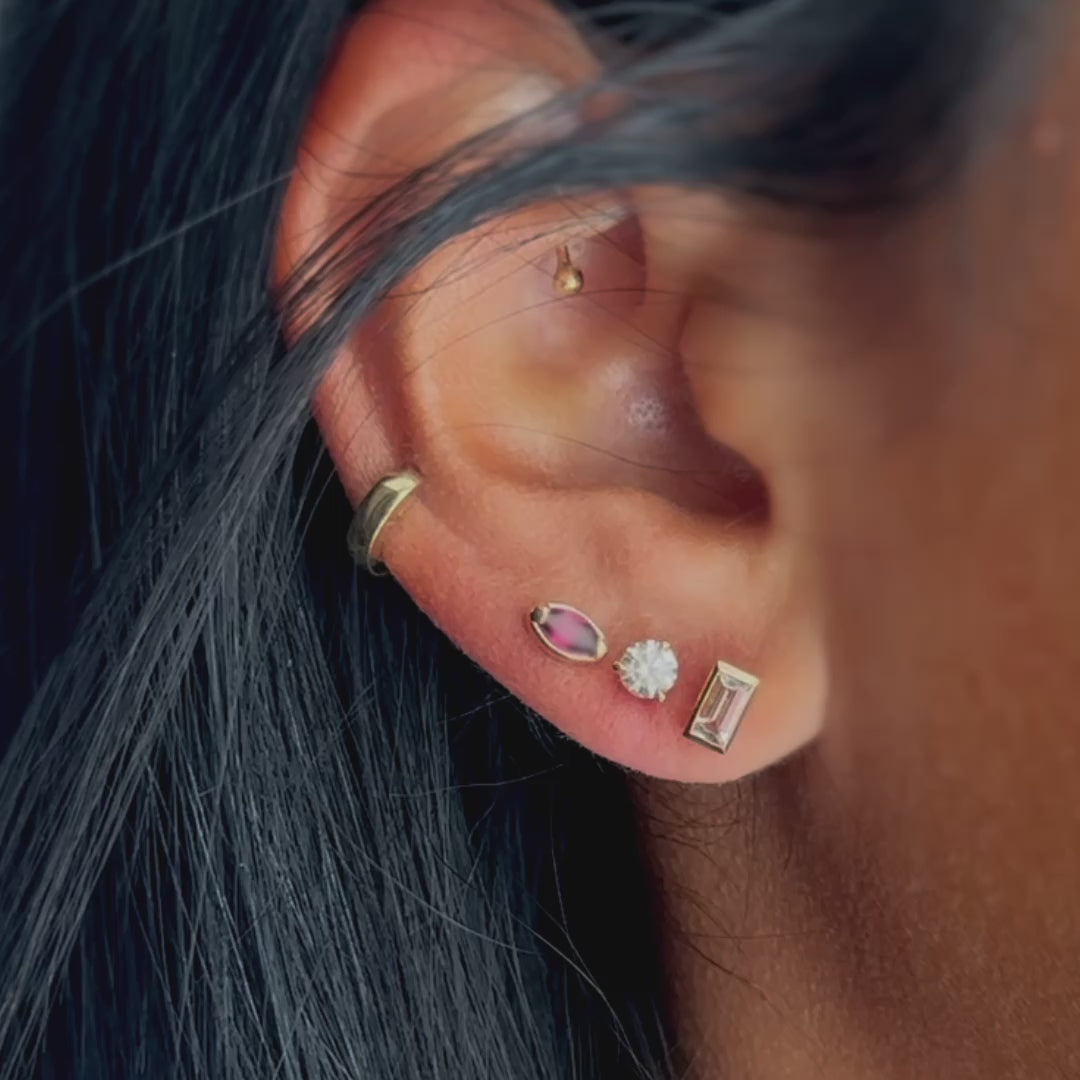 Topaz Baguette Studs opens full screen video in same window.